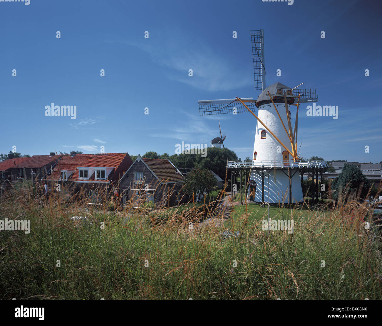 grass houses homes Holland Netherlands Wemeldinge windmill landmark ...
