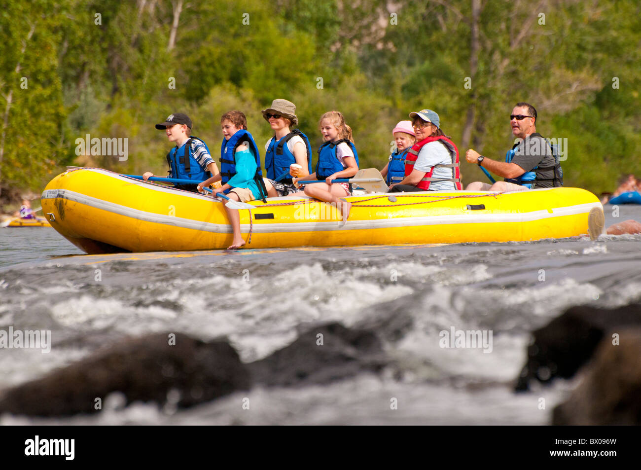 People floating/rafting the Boise river that runs through Downtown ...