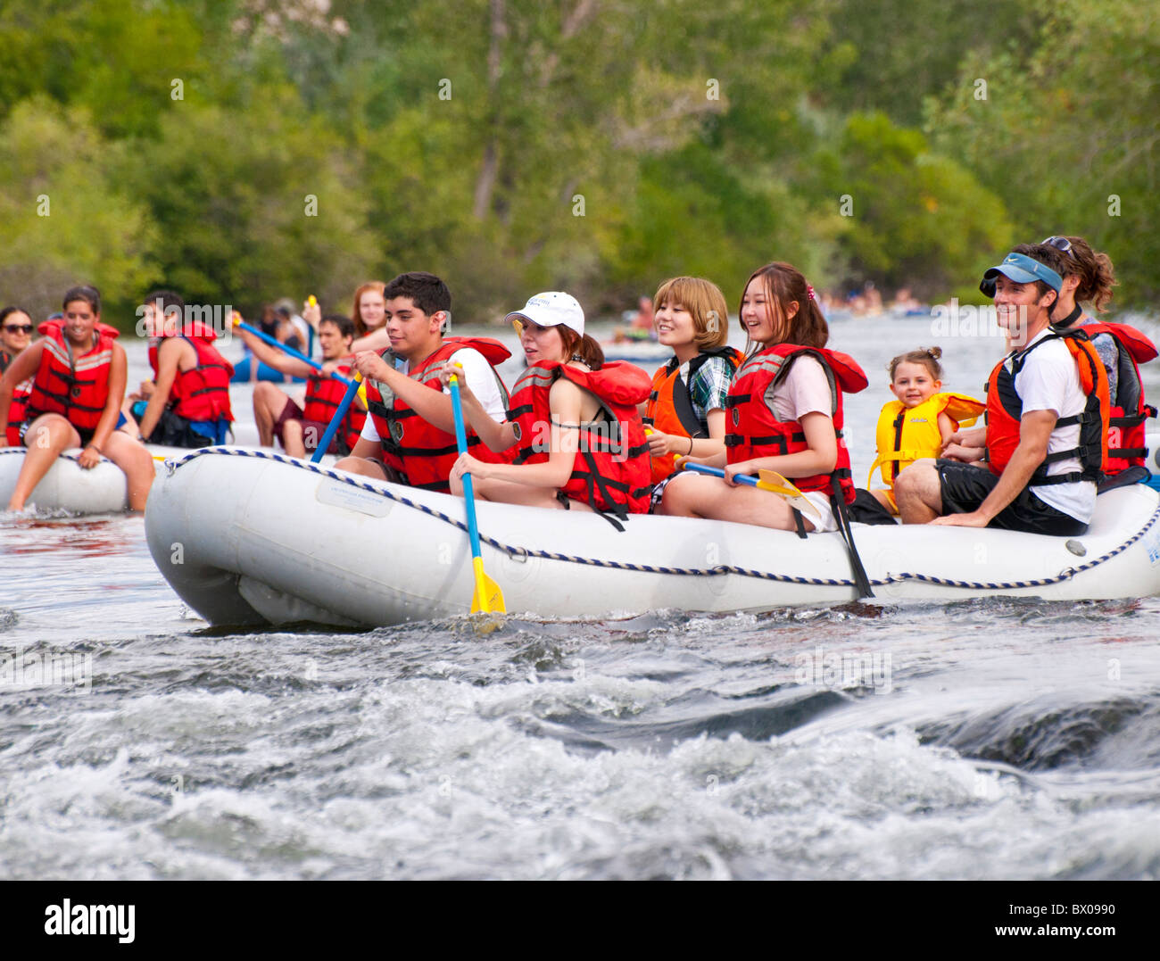 People floating/rafting the Boise river that runs through Downtown ...