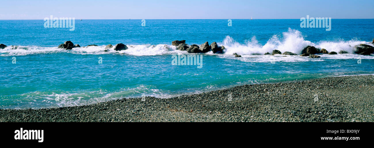 surf waves Chiavari rock cliff Italy Europe coast Liguria sea panorama ...