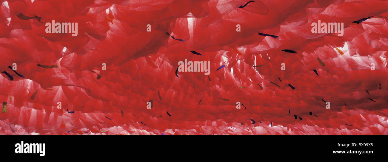 Red prayer flags flying in the wind, Zhiduo, Qinghai Province, China ...