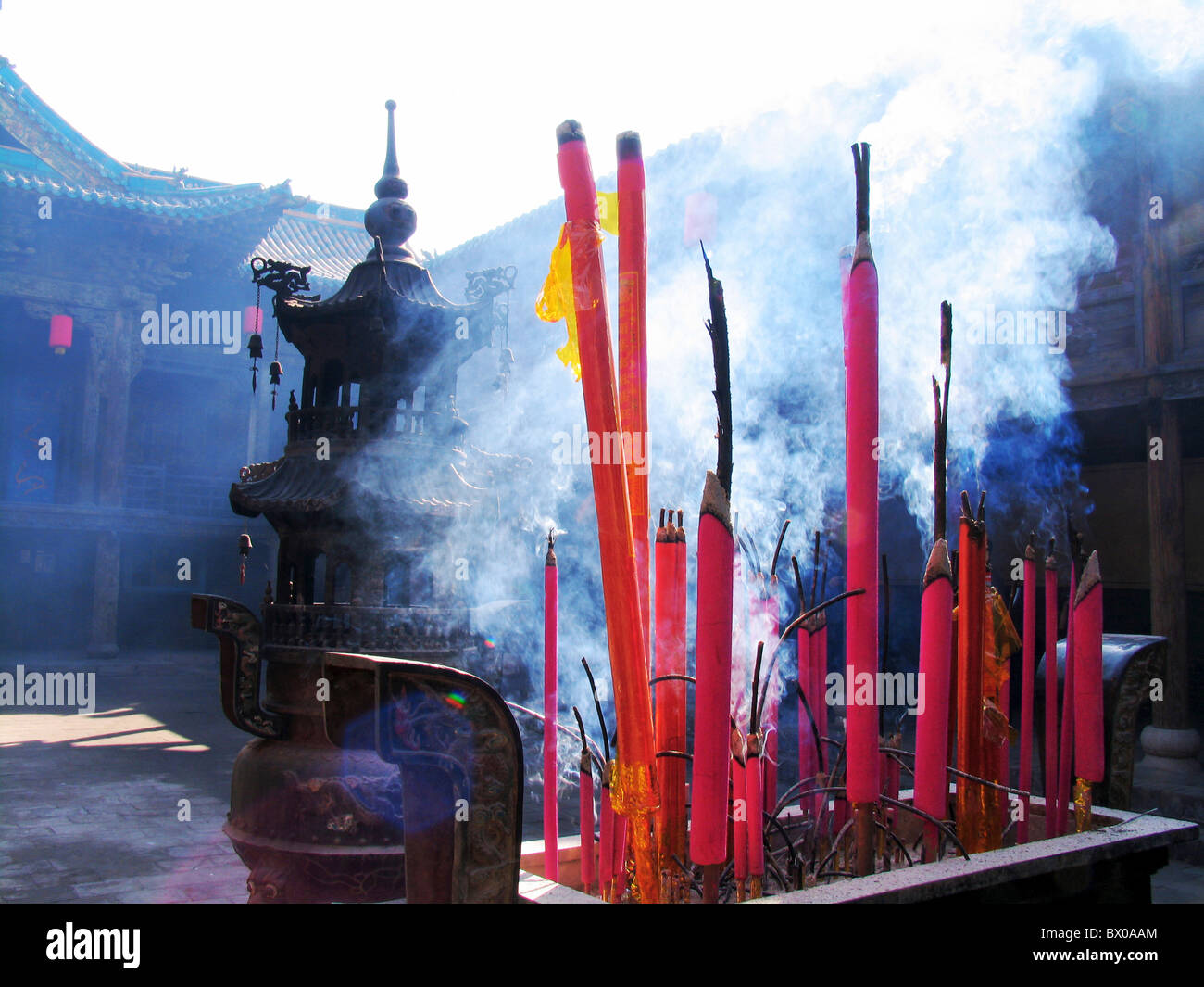 Burning incense, Temple of the City God, Pingyao, Shanxi Province ...
