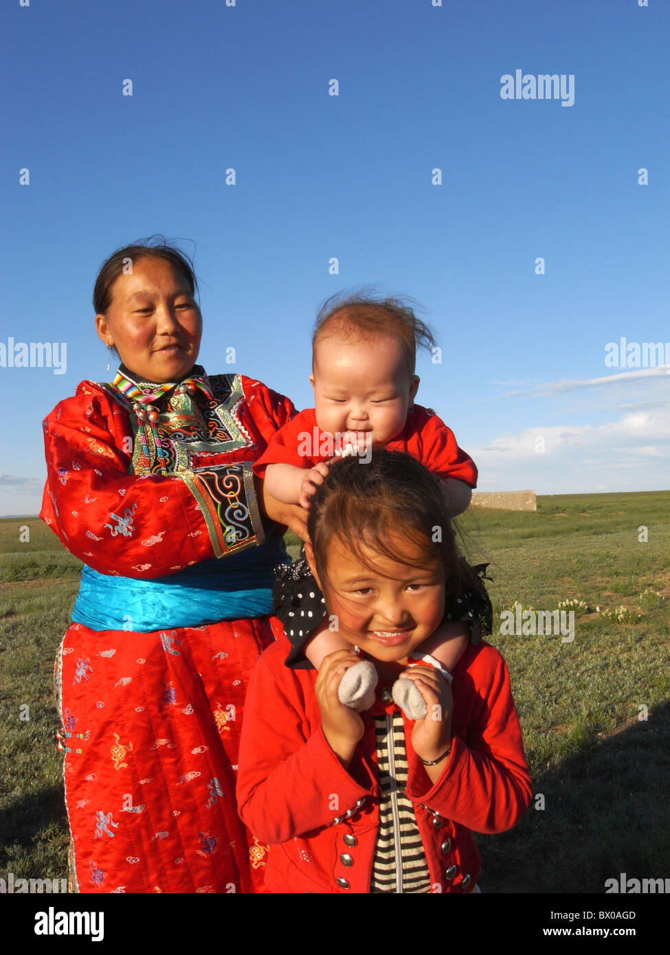 Mongolian woman with her children, Xilin Gol Grassland, Xilinhot, Inner ...
