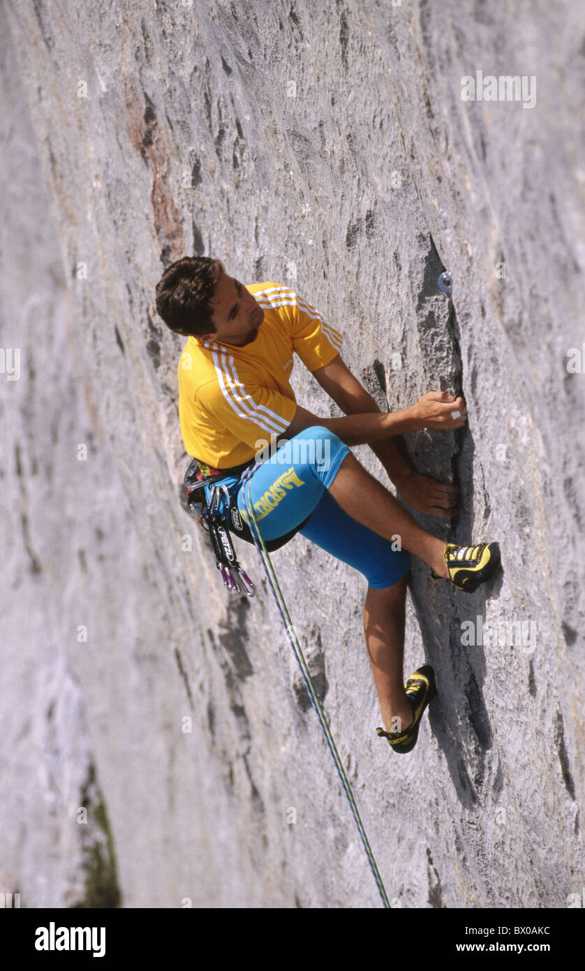 action cliff wall climbing free climbing man rope sport mountain Stock ...