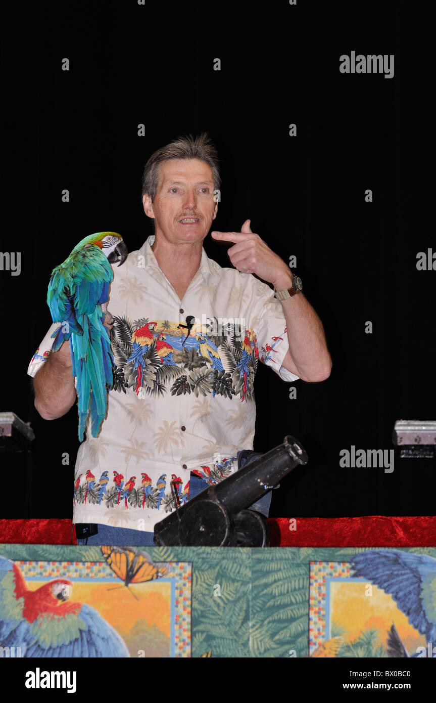 Animal show with trained parrot Stock Photo - Alamy