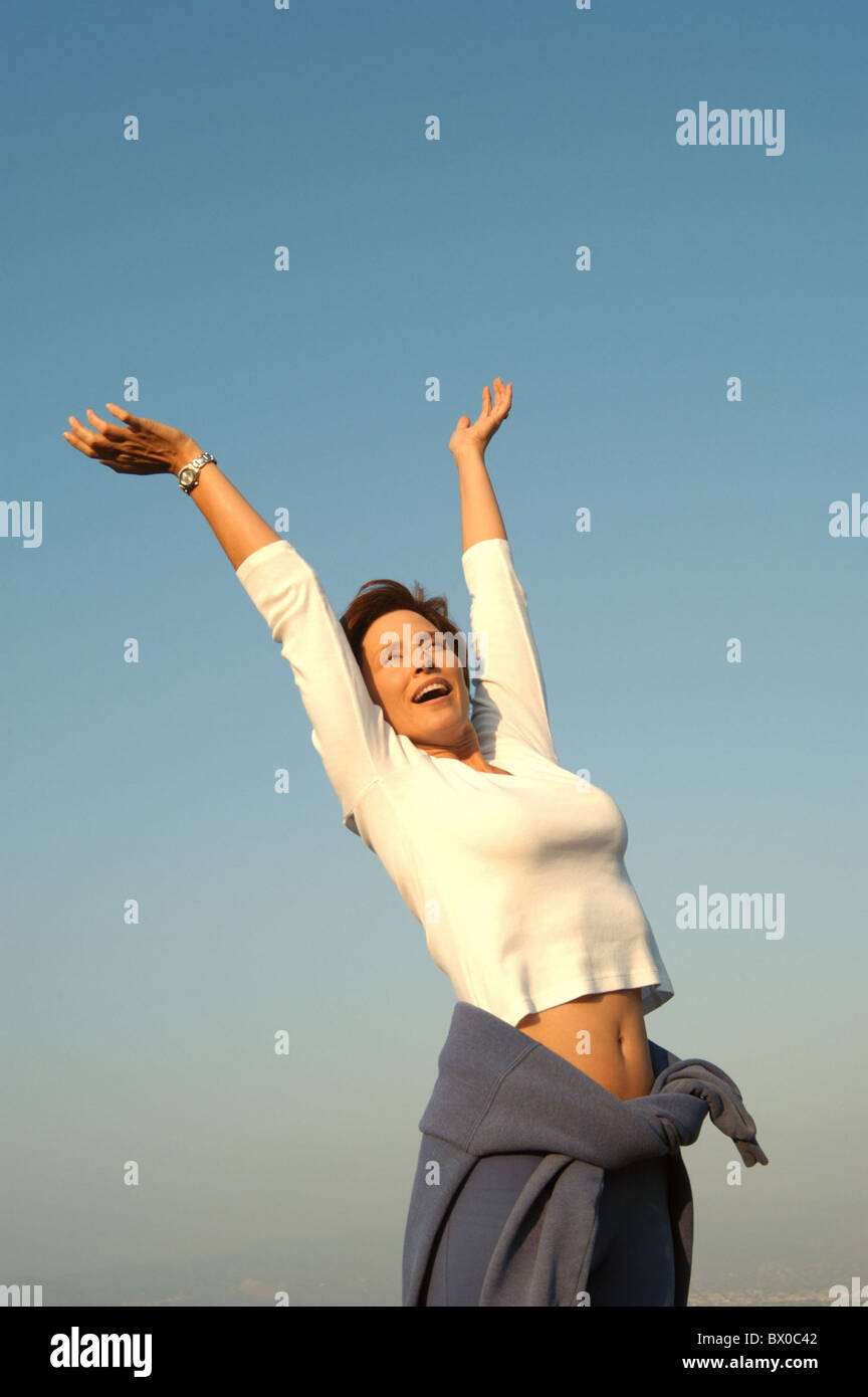 arms high-stretching outside success result woman joy sky laughter joy ...