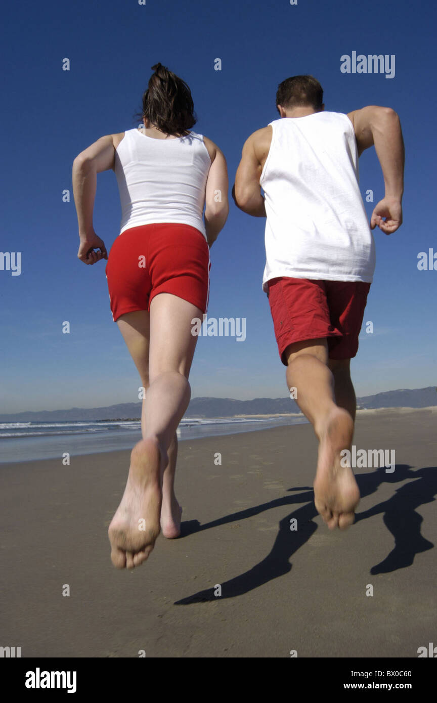 action fitness jogging jogging sport sea nature pair couple back view ...