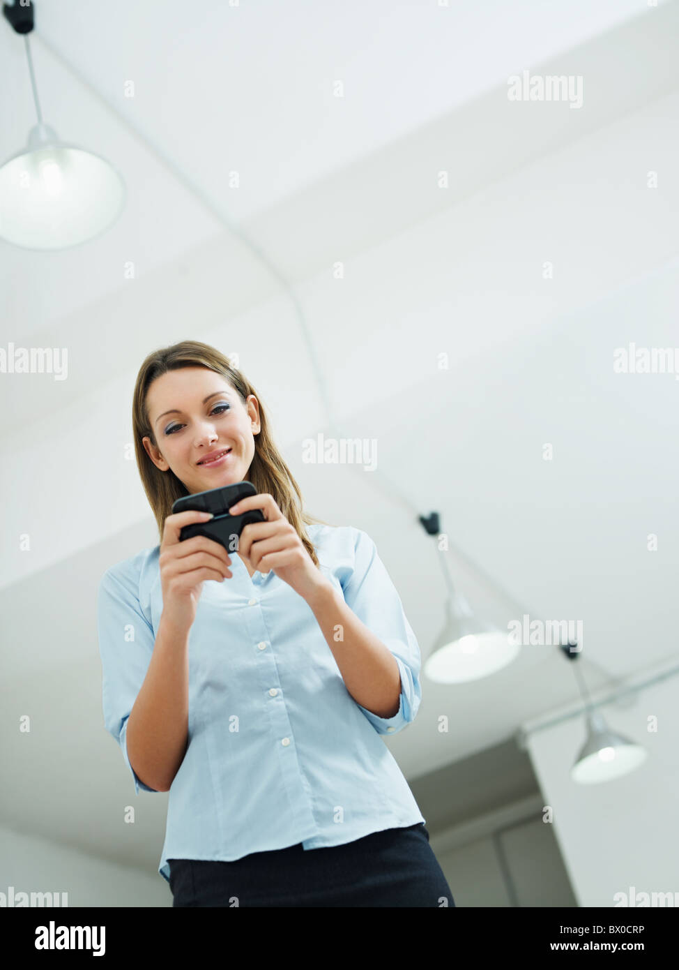 woman reading emails on mobile phone. Copy space Stock Photo - Alamy