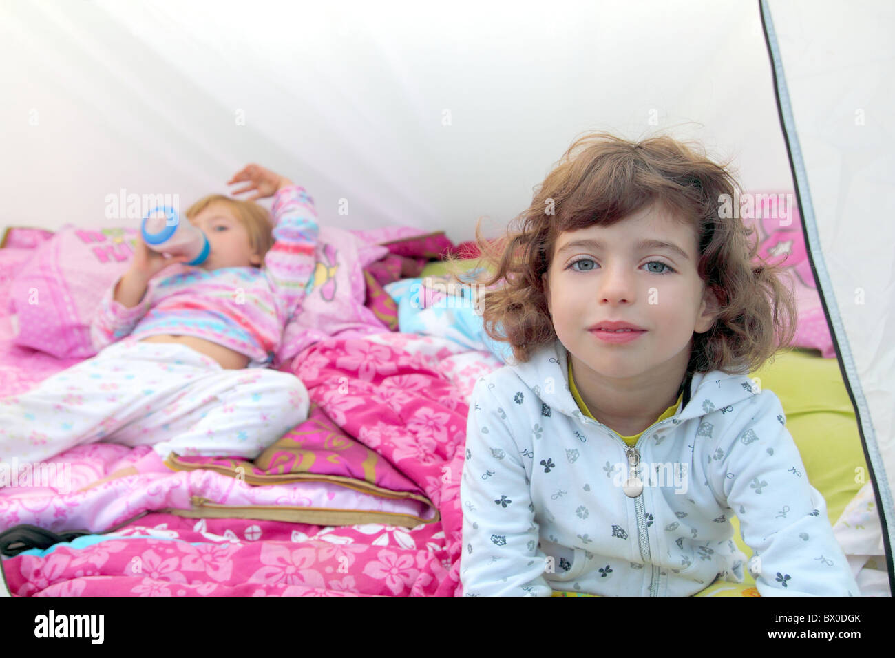 girls inside camping tent sisters happy two little friends Stock Photo ...