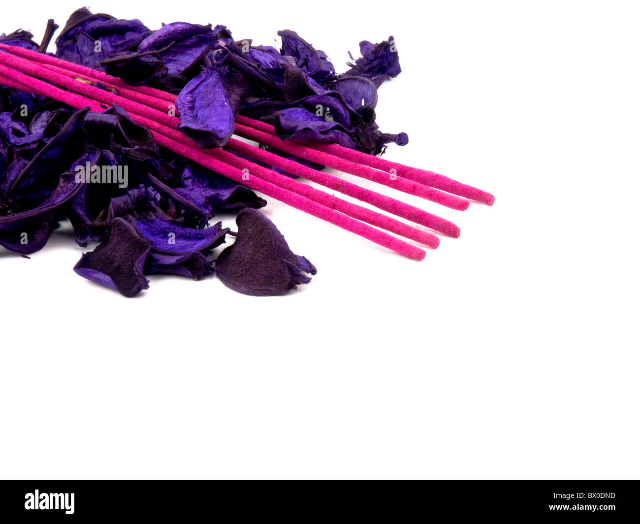 Aromatic purple potpourri and pink incenses on white background Stock ...