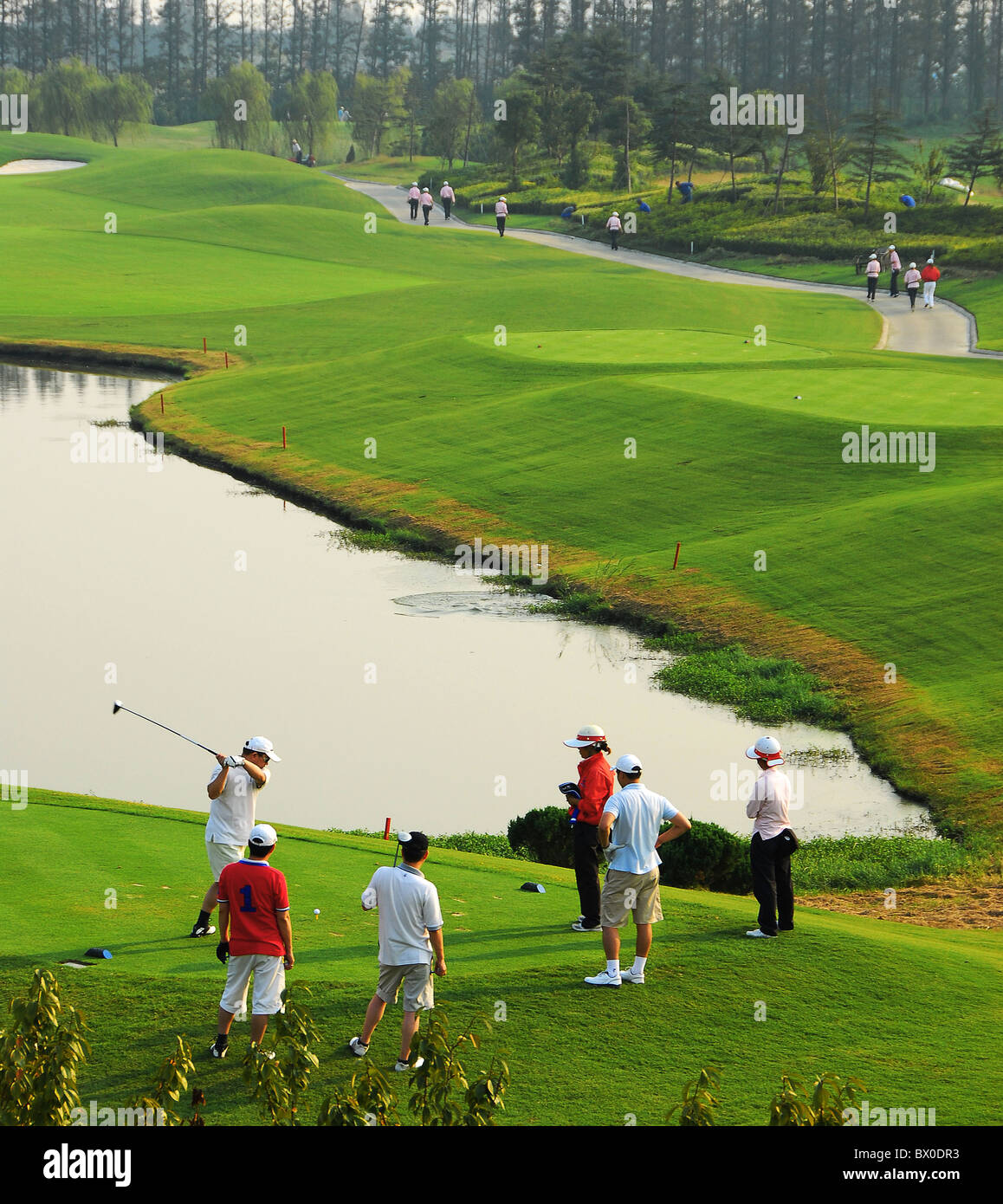 Asian golfer pond hi-res stock photography and images - Alamy