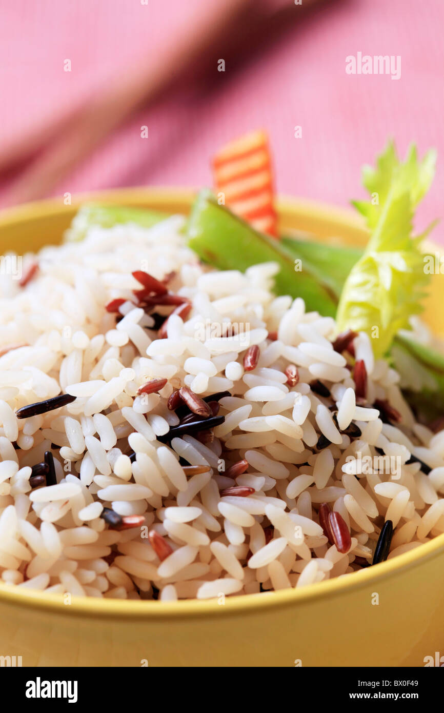 Bowl of cooked mixed rice Stock Photo - Alamy