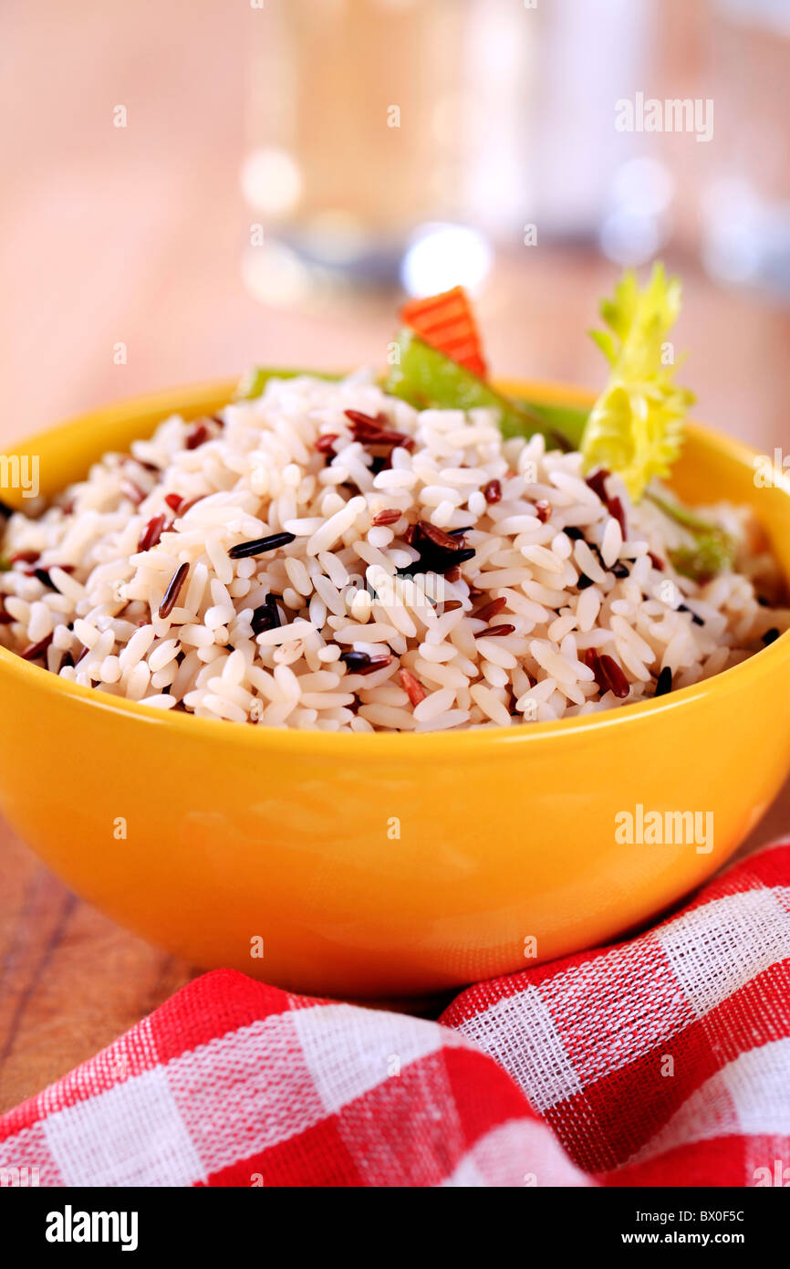 Bowl of cooked mixed rice Stock Photo - Alamy