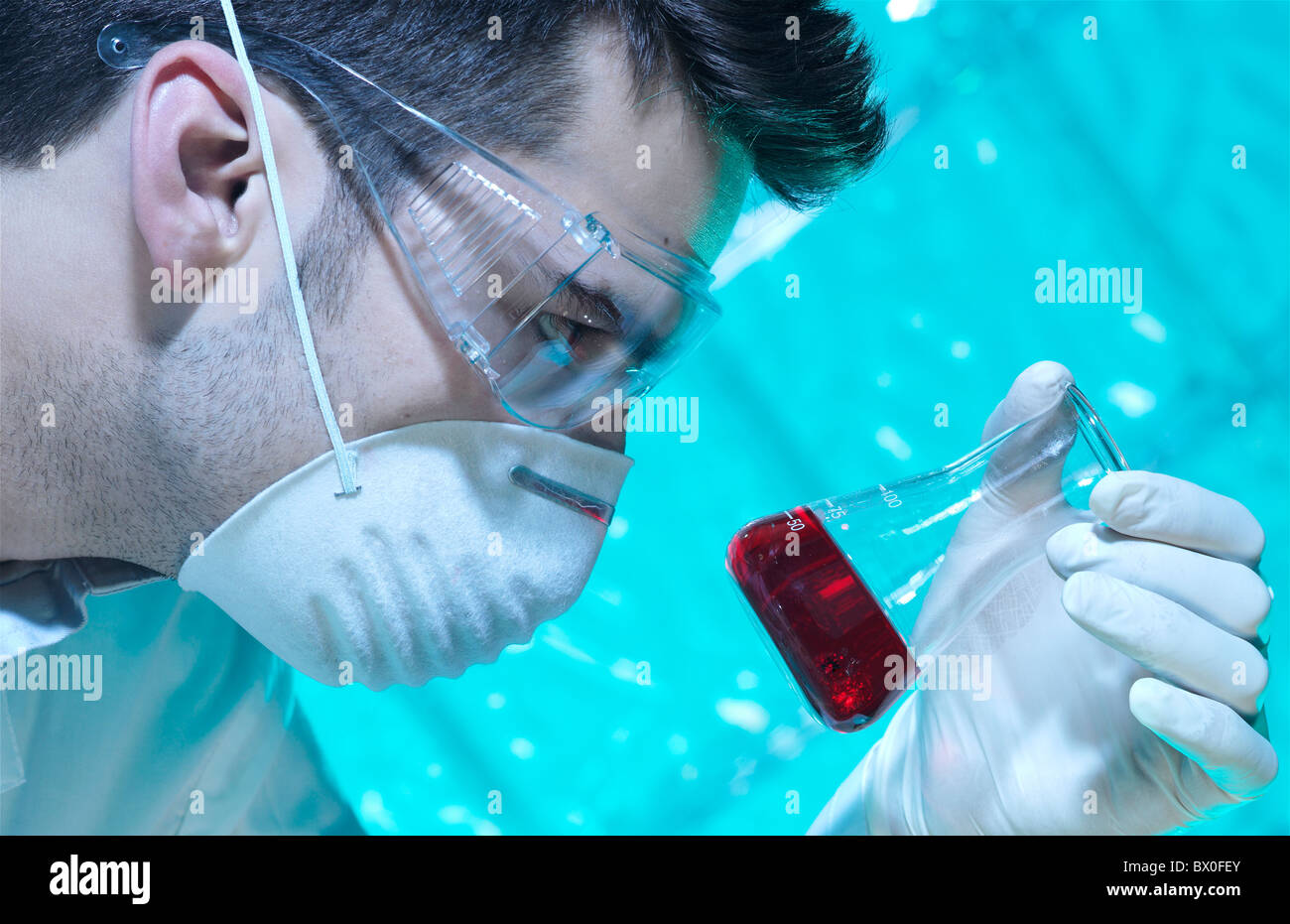Young man scientist in chemistry Stock Photo - Alamy