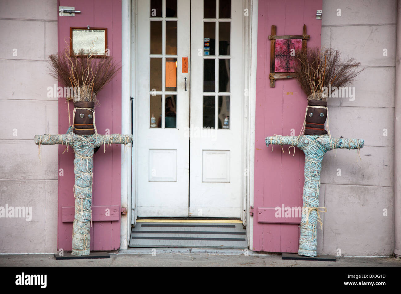 Two large voodoo dolls decorate the exterior of a voodoo shop in New ...