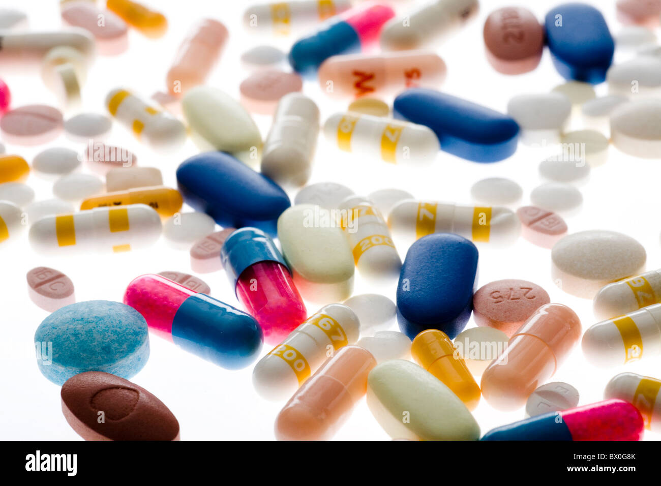 Colorful tablets with capsules Stock Photo - Alamy