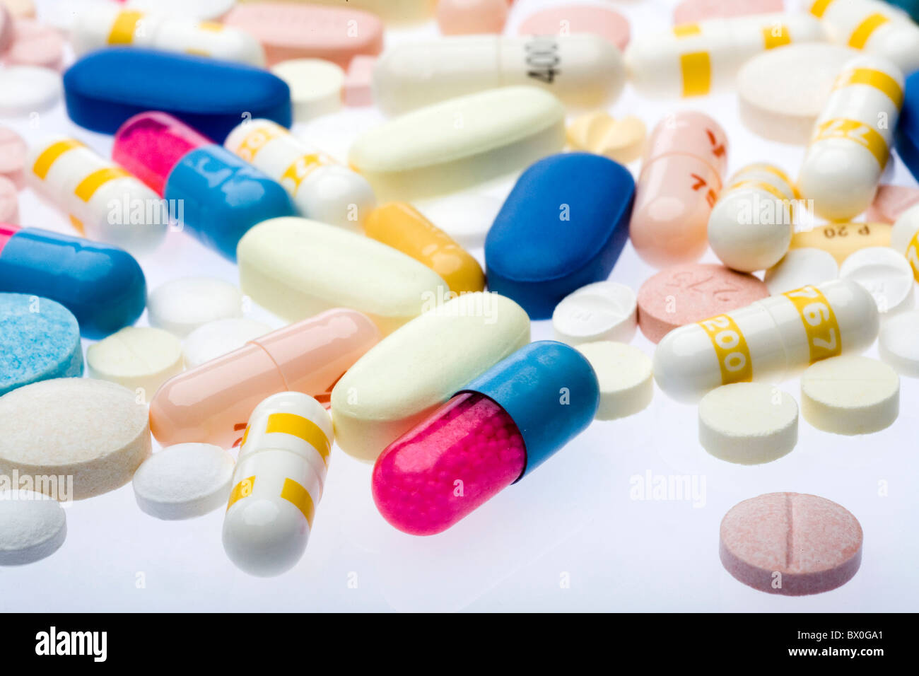 Colorful tablets with capsules Stock Photo - Alamy