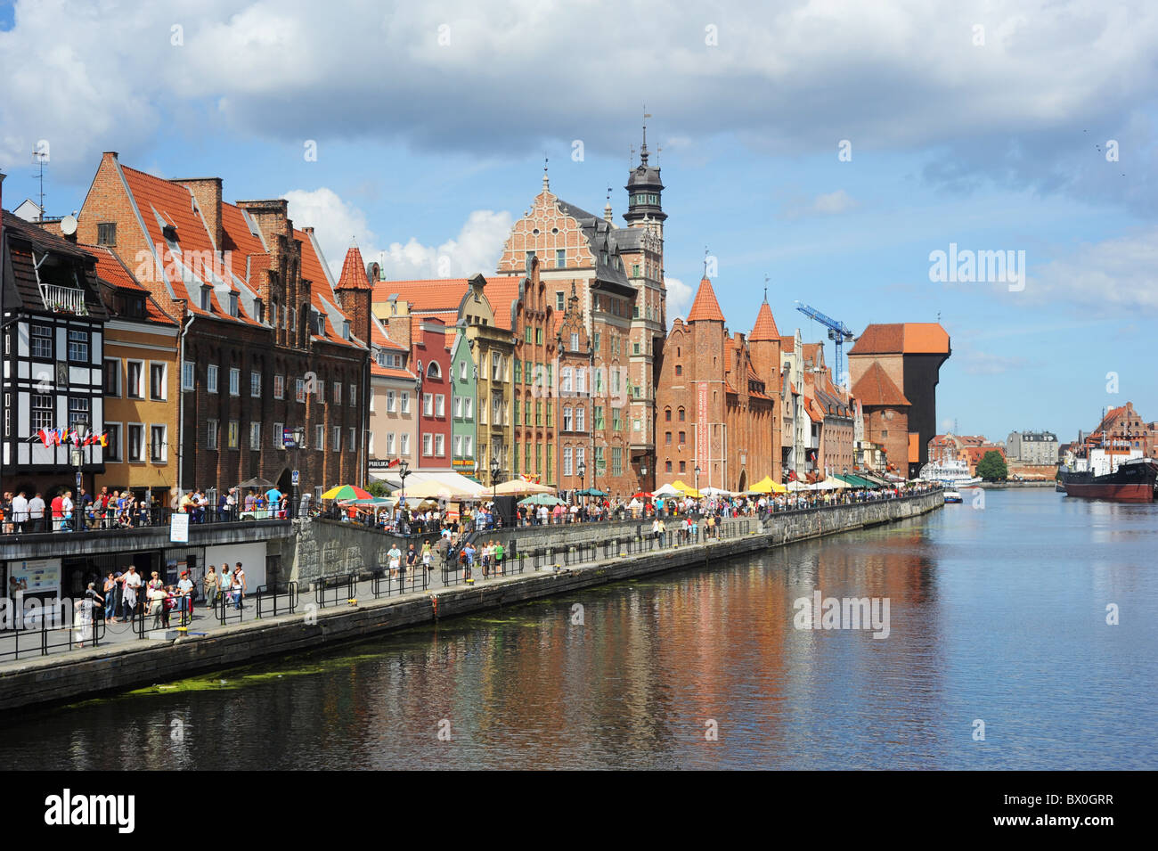The classic view of Gdansk with the Hanseatic-style buildings reflected ...