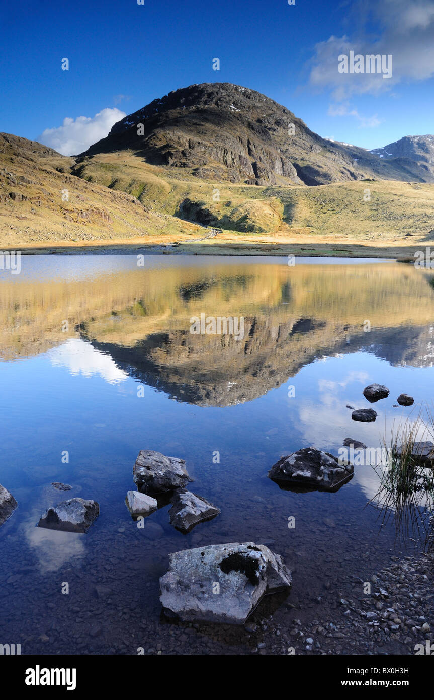 Great End reflected in Styhead Tarn in the English Lake District Stock ...
