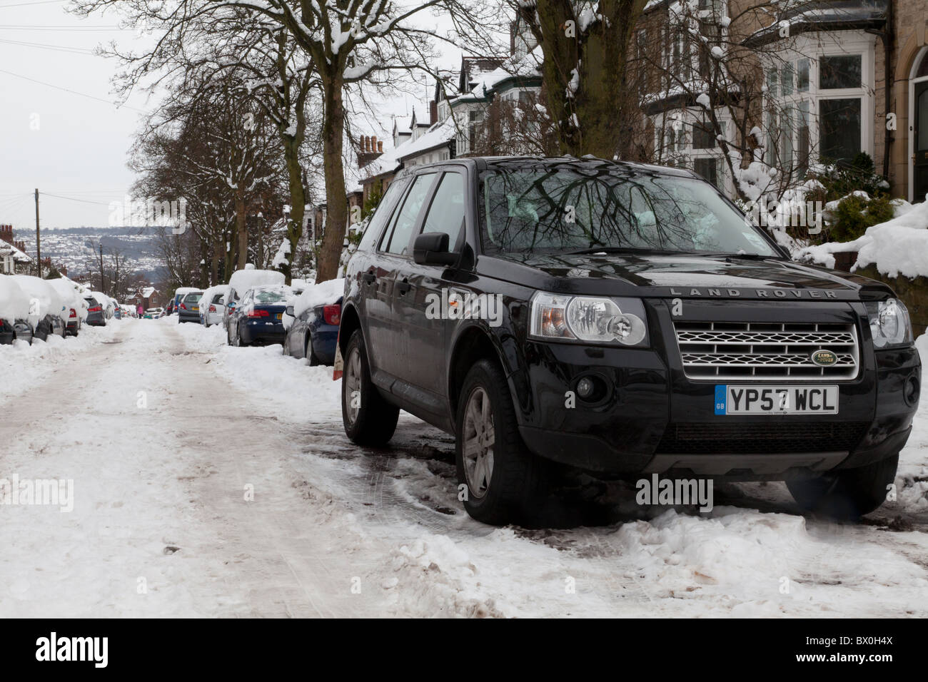 A Land Rover Discovery on a snow covered street in Sheffield after a ...