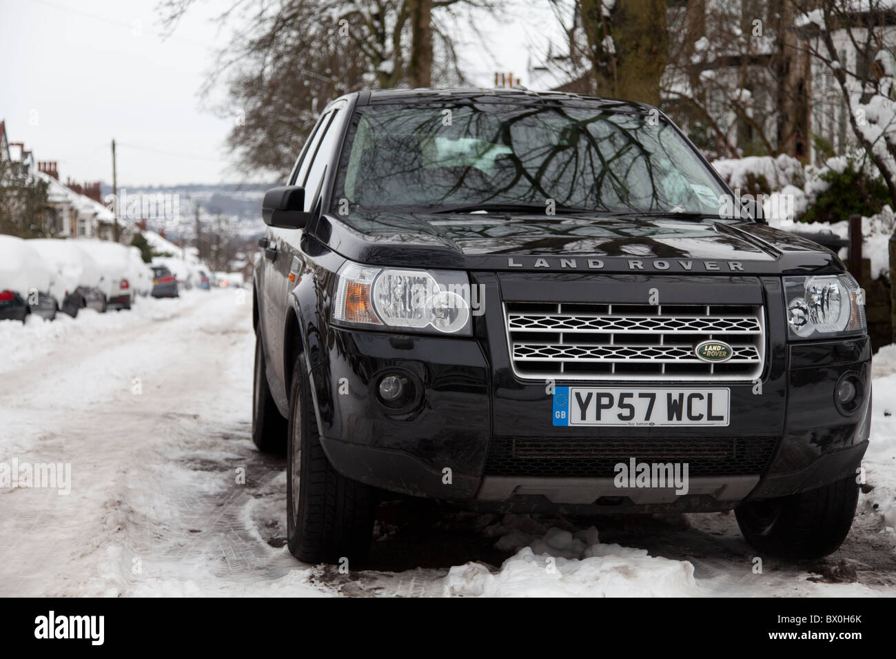 A Land Rover Discovery on a snow covered street in Sheffield after a ...