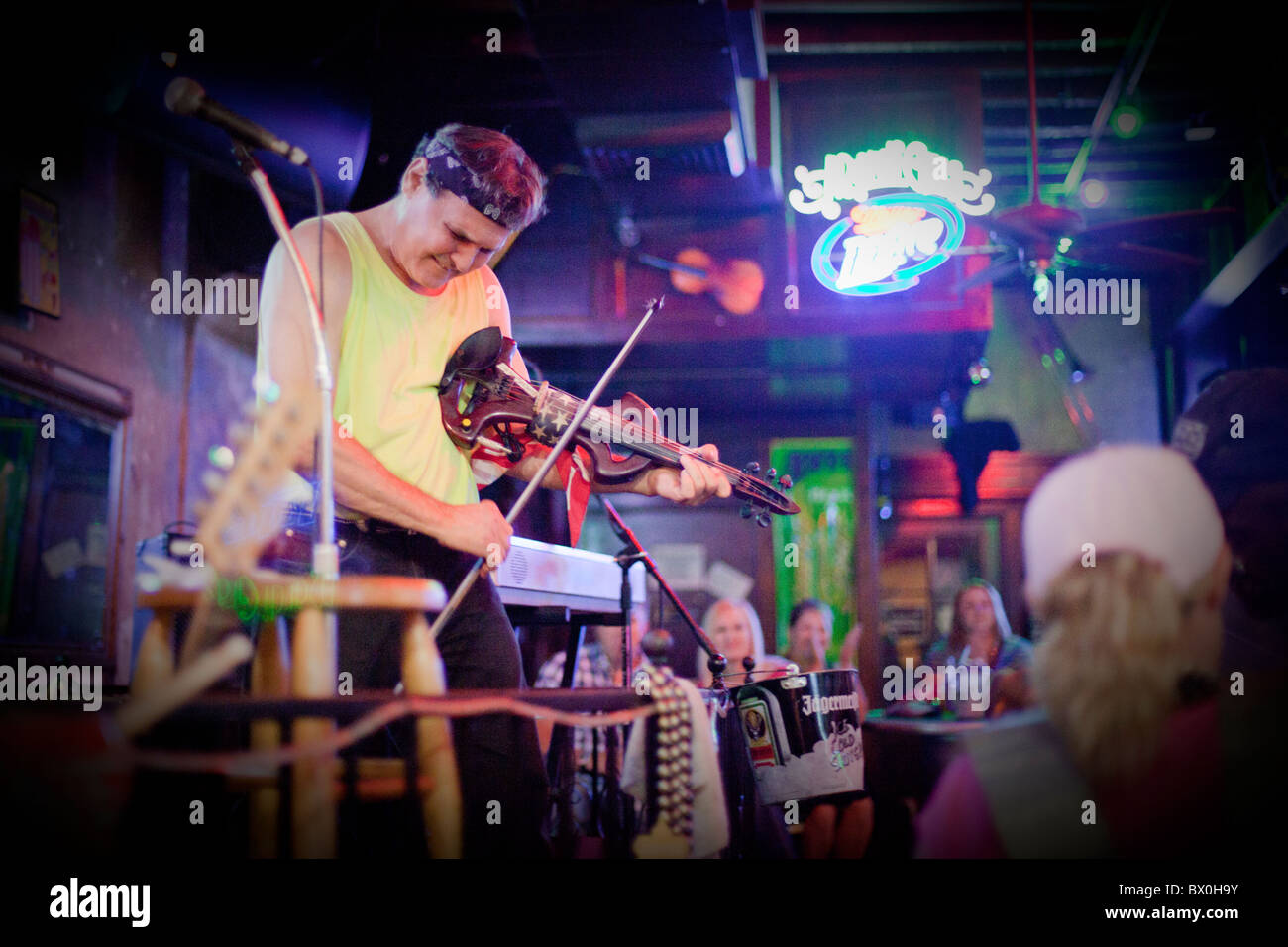 The Danny T Band (Danny T on fiddle) plays a mean zydeco at a bar on ...