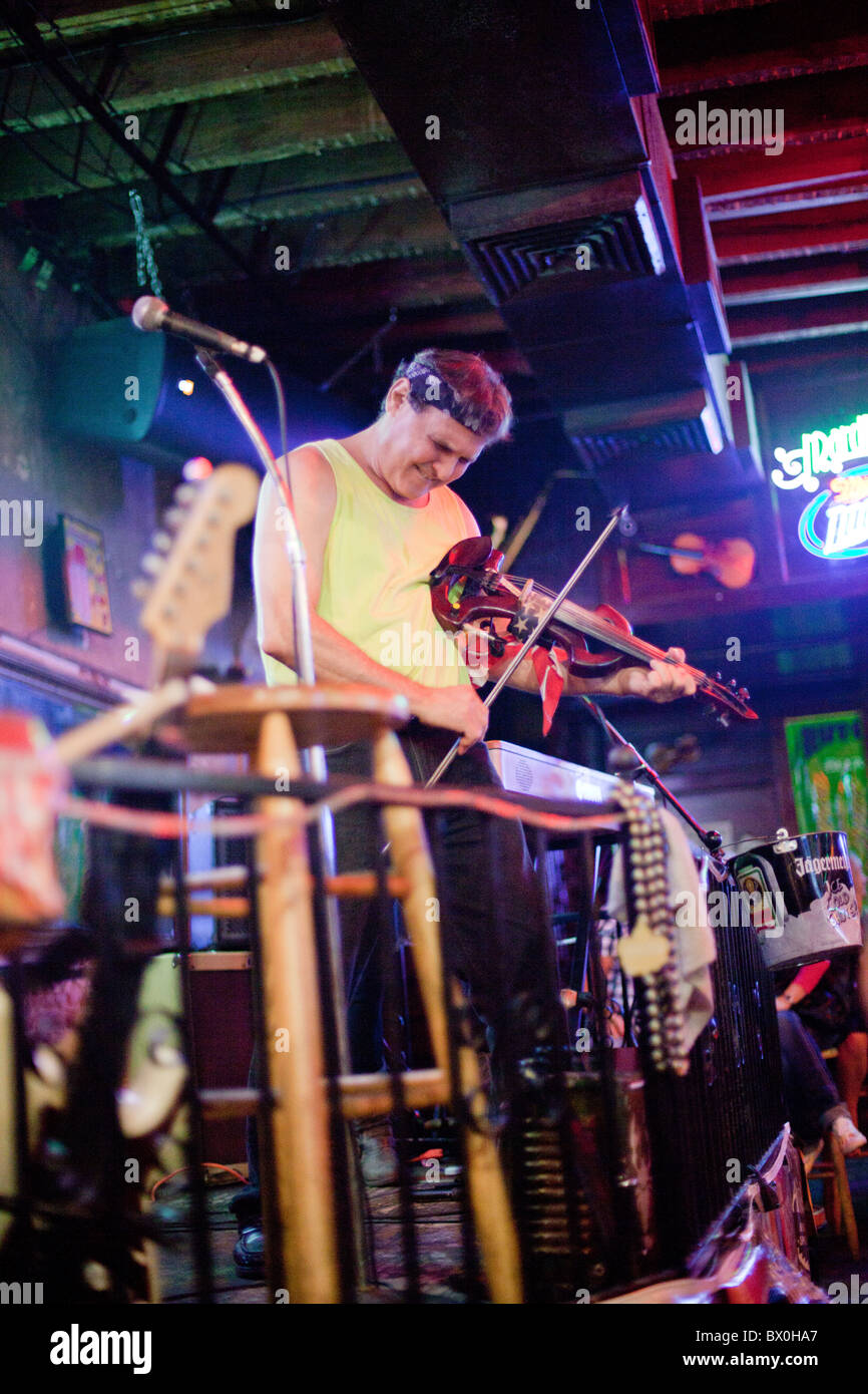 The Danny T Band (Danny T on fiddle) plays a mean zydeco at a bar on ...