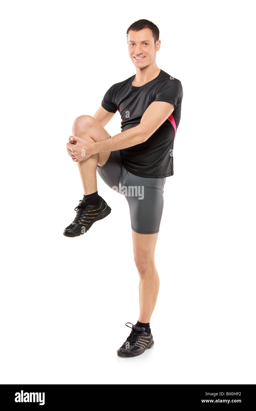 Full length portrait of a young athlete exercising Stock Photo - Alamy