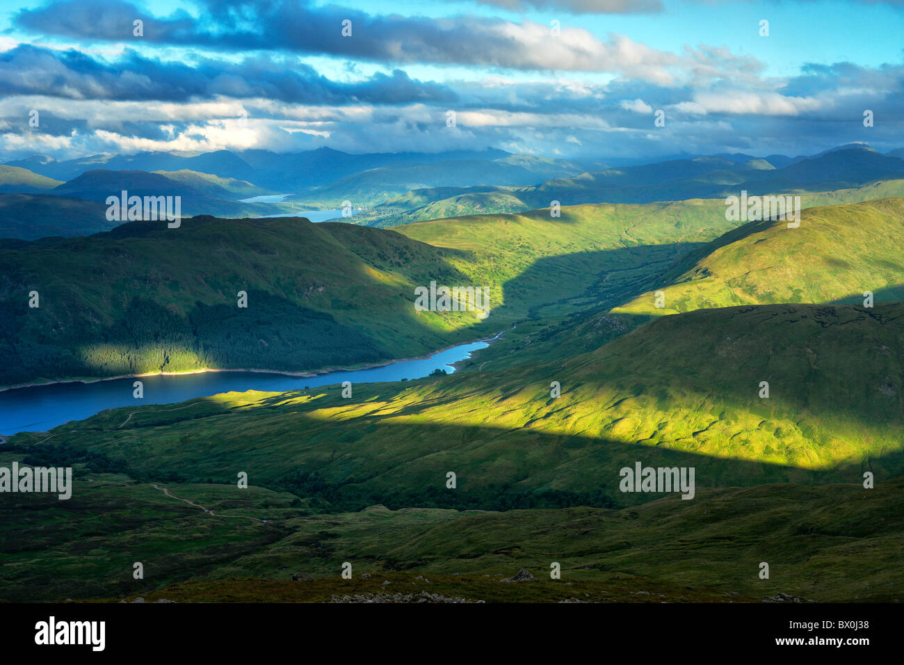 Daybreak on Loch Katrine and the Arrochar Alps from the summit of Ben ...