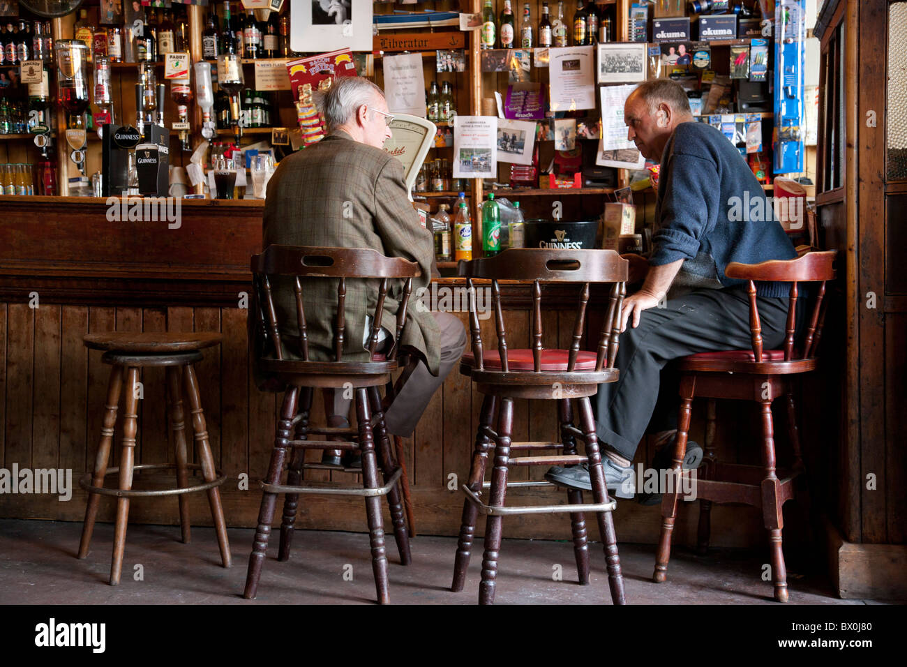 men drinking in traditional Irish pub Cahersiveen, County Kerry Ireland ...
