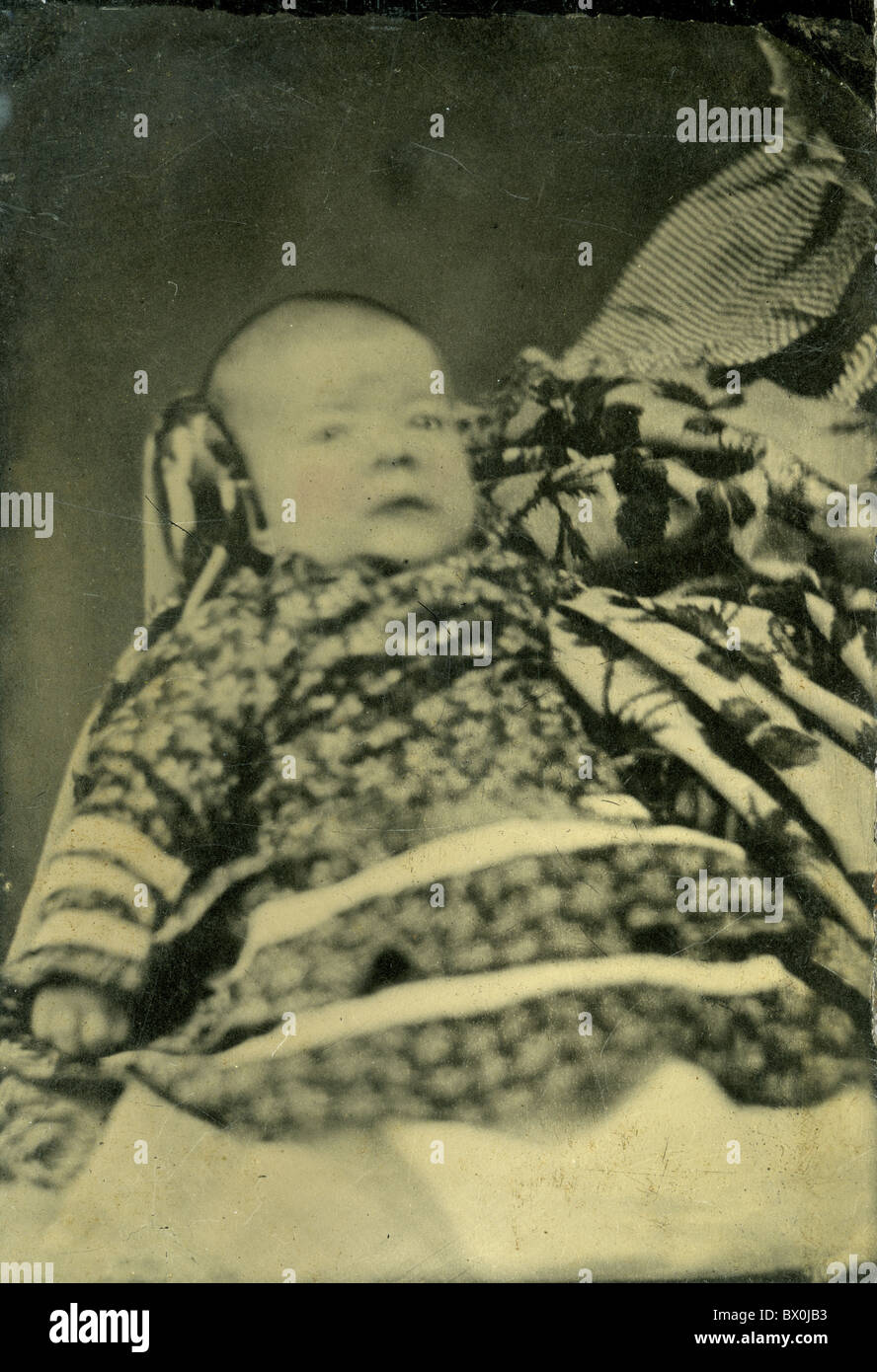 Black woman holding white baby hi-res stock photography and images - Alamy