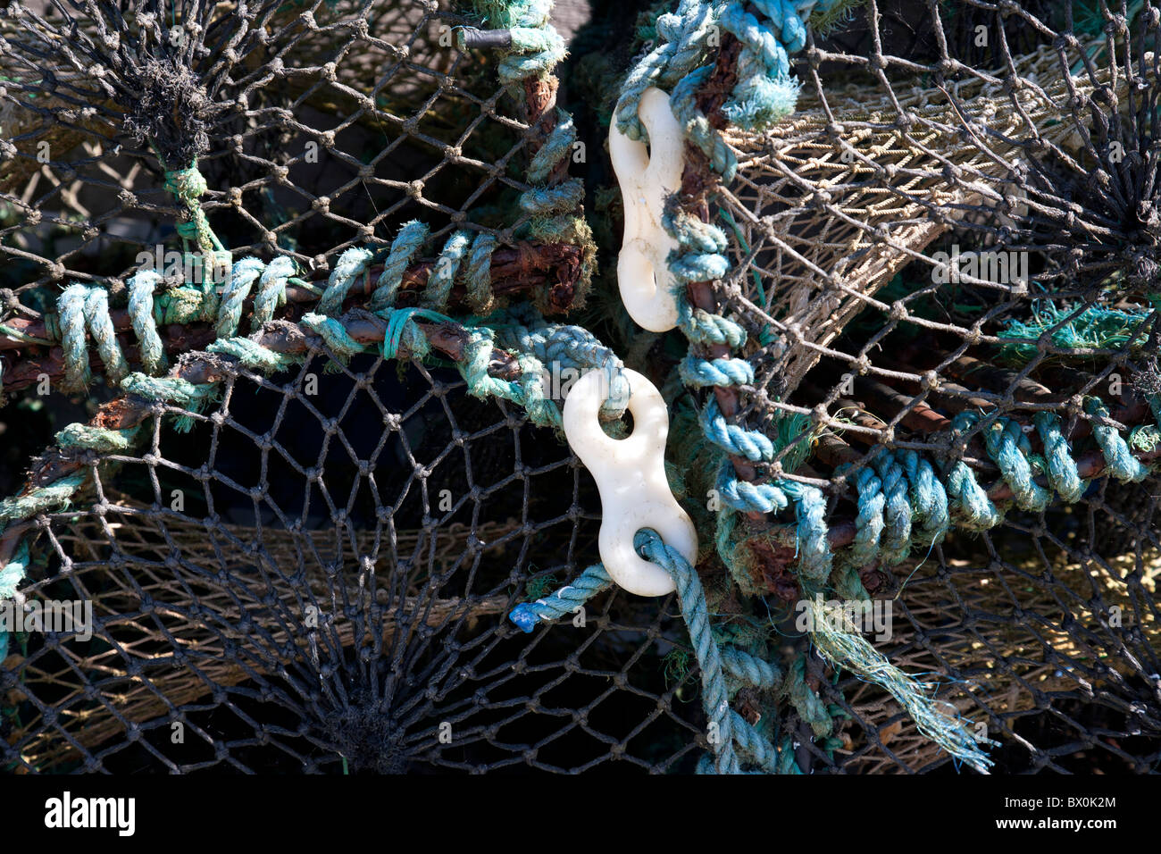Lobster pots tied with blue rope, County Kerry Ireland Stock Photo - Alamy