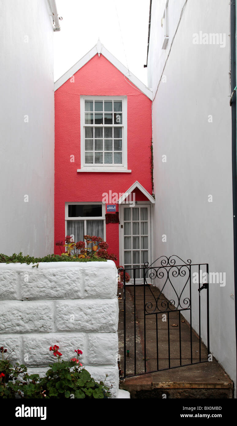 A very narrow house between two high walls Stock Photo - Alamy