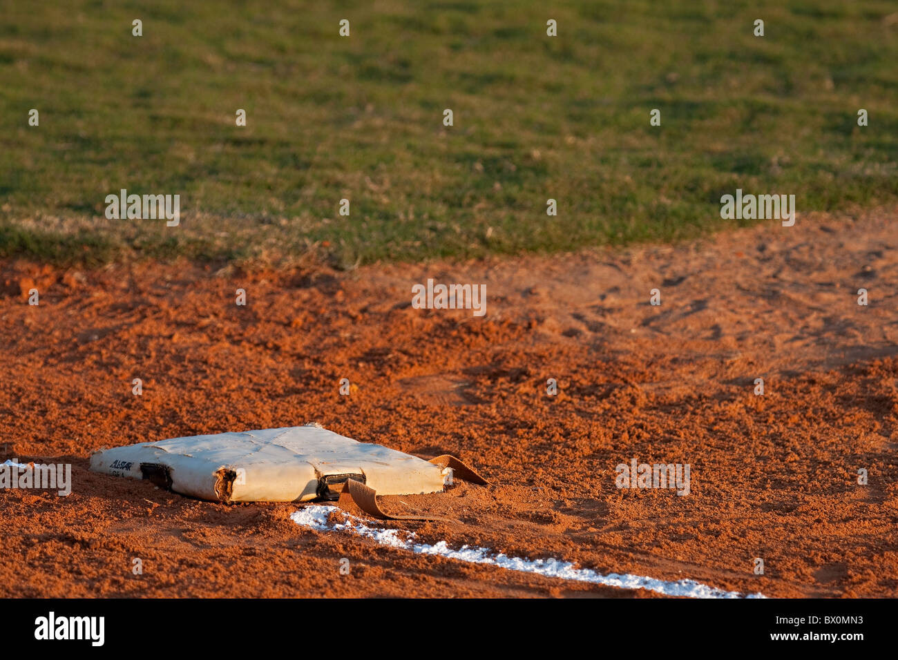First base on baseball field in the early morning Stock Photo - Alamy