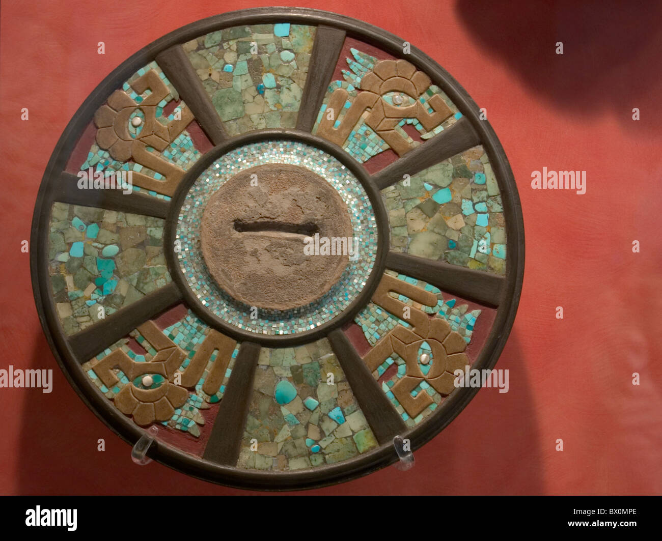 A turquoise mosaic disc funeral offering found in the Mayan city of ...