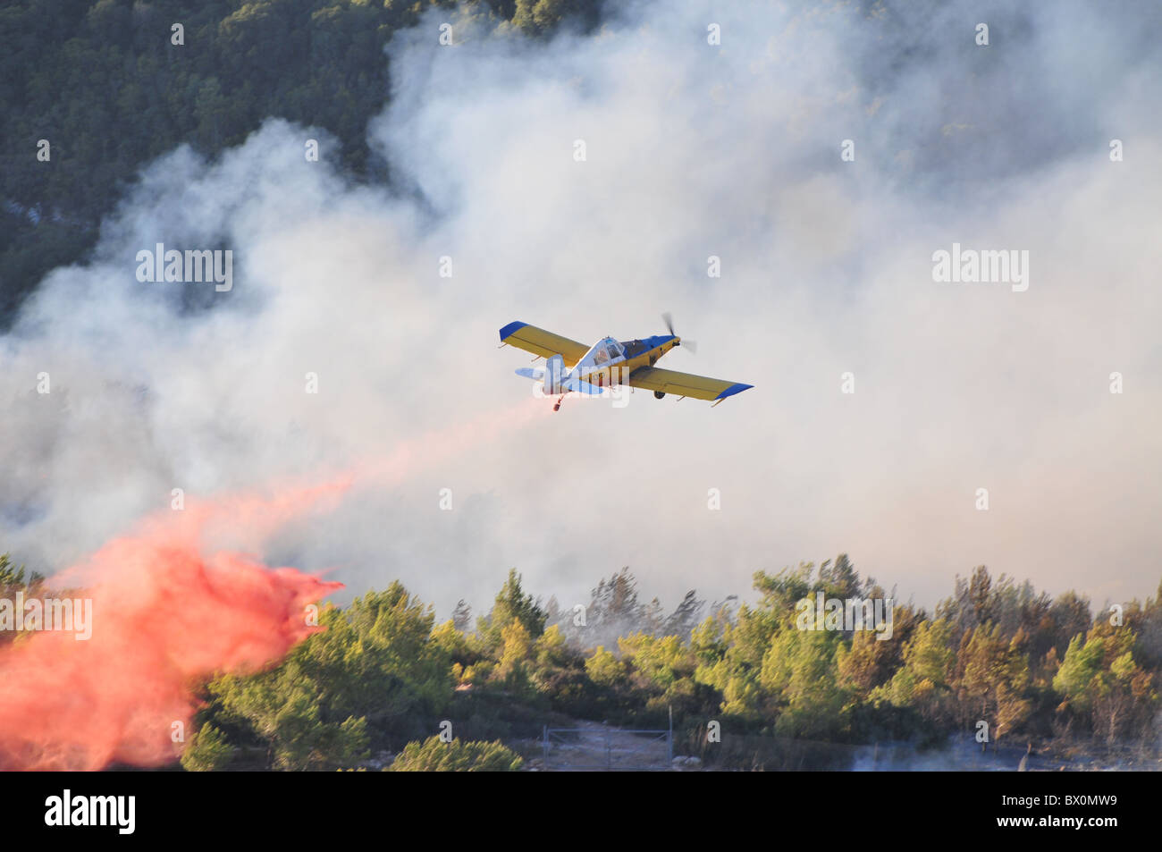 Fire retardant is dropped from planes as a huge forest fire rages on ...