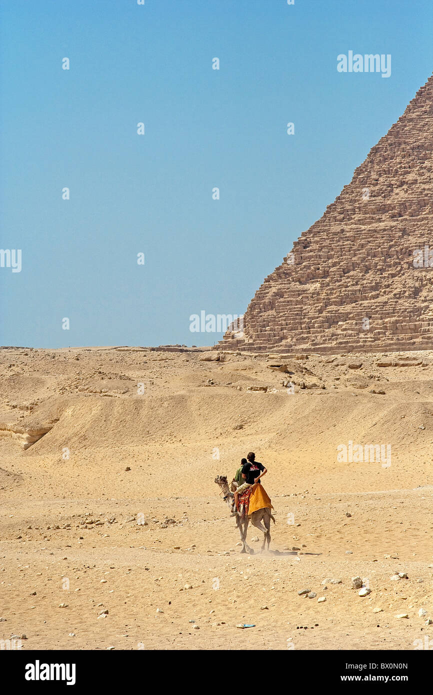 Riding Camel at Pyramids of Giza Cairo, Egypt Stock Photo - Alamy