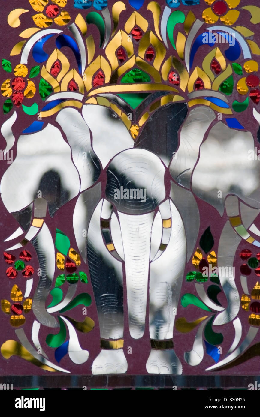 Colorful painted glass is a decoration at a Buddhist temple in Mae Hong ...