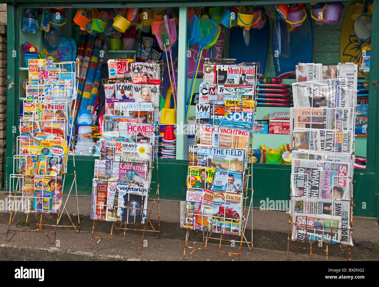 A selection of UK magazines and newspapers outside a newsagents Stock ...
