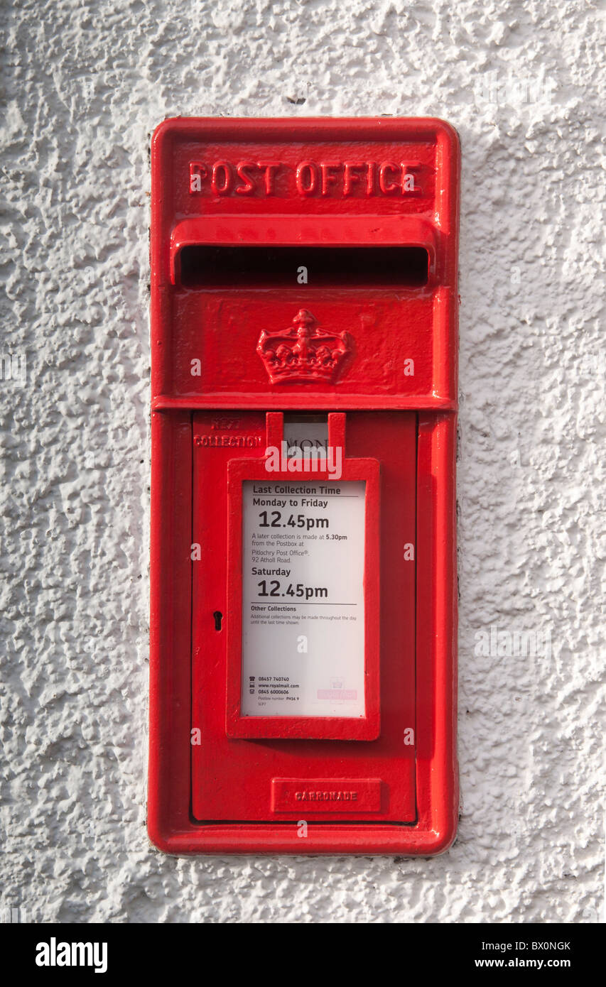 Traditional Post Box in white pebble dash wall Stock Photo - Alamy