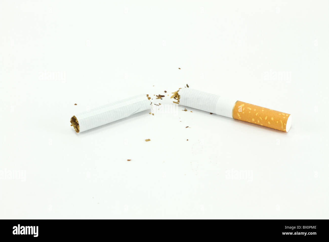Isolated Broken cigarette on a white background Stock Photo - Alamy