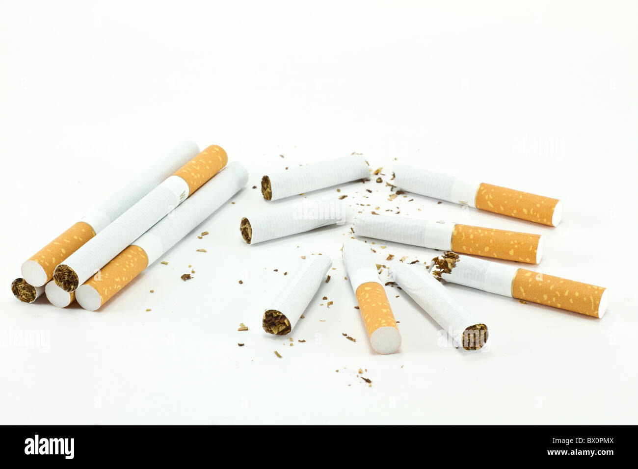 Isolated Broken cigarette on a white background Stock Photo - Alamy