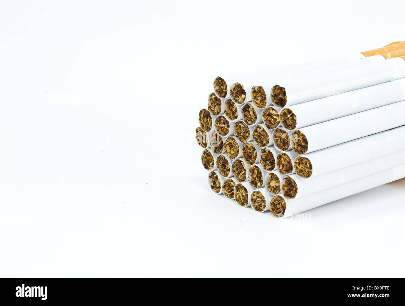 a bunch of cigarettes isolated on white Stock Photo - Alamy