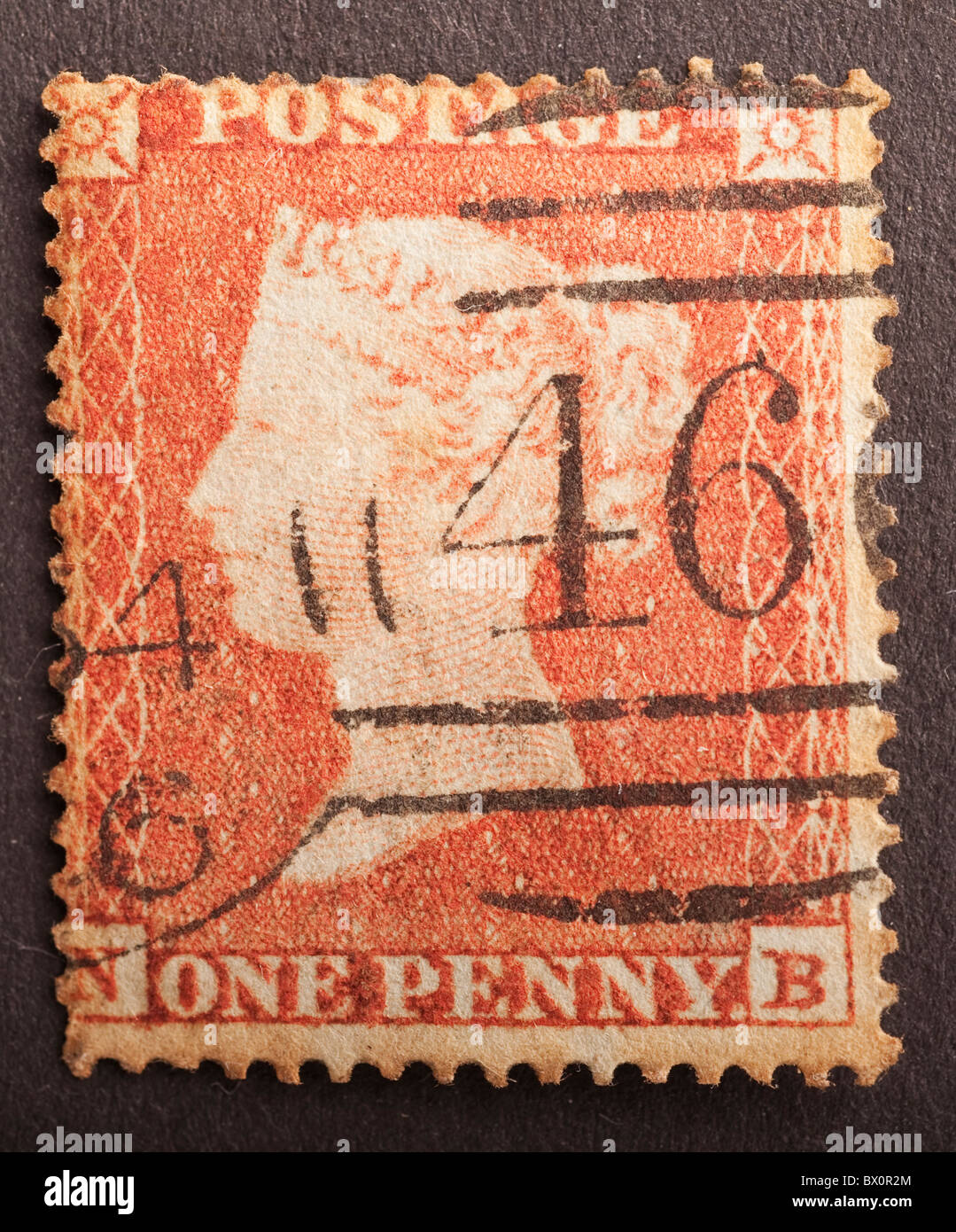 British Postage Stamp, Penny Red, Corner Letters N, B Stock Photo - Alamy