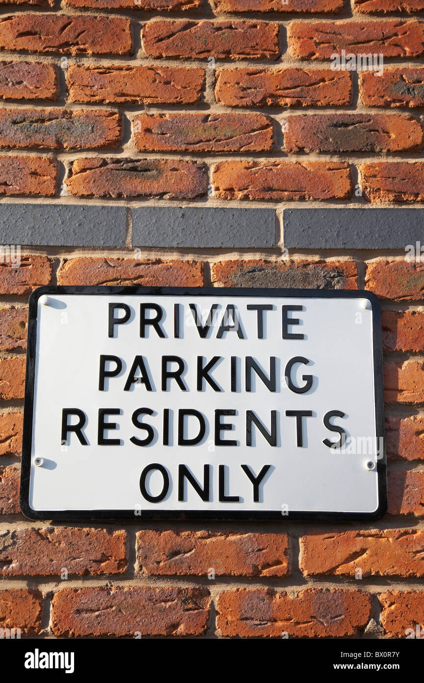 Warning sign on wall Stock Photo - Alamy