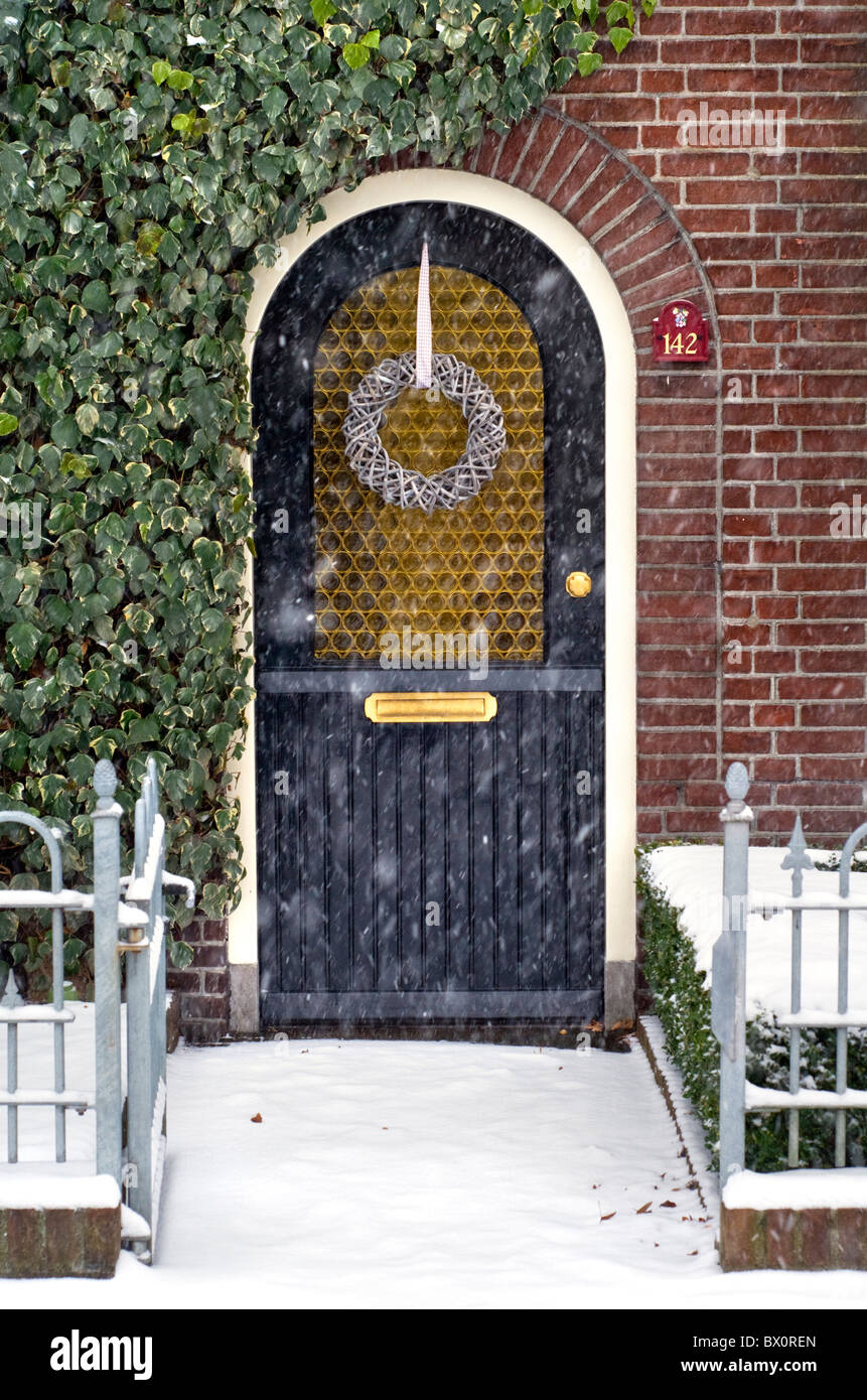 Show falling outside the front door of a house in the Netherlands Stock ...