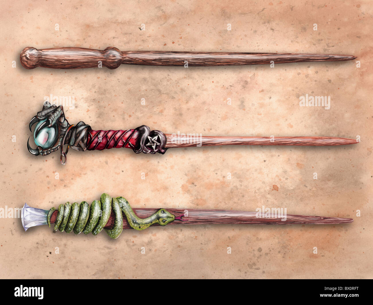 Three magical wizard wands on old parchment Stock Photo - Alamy
