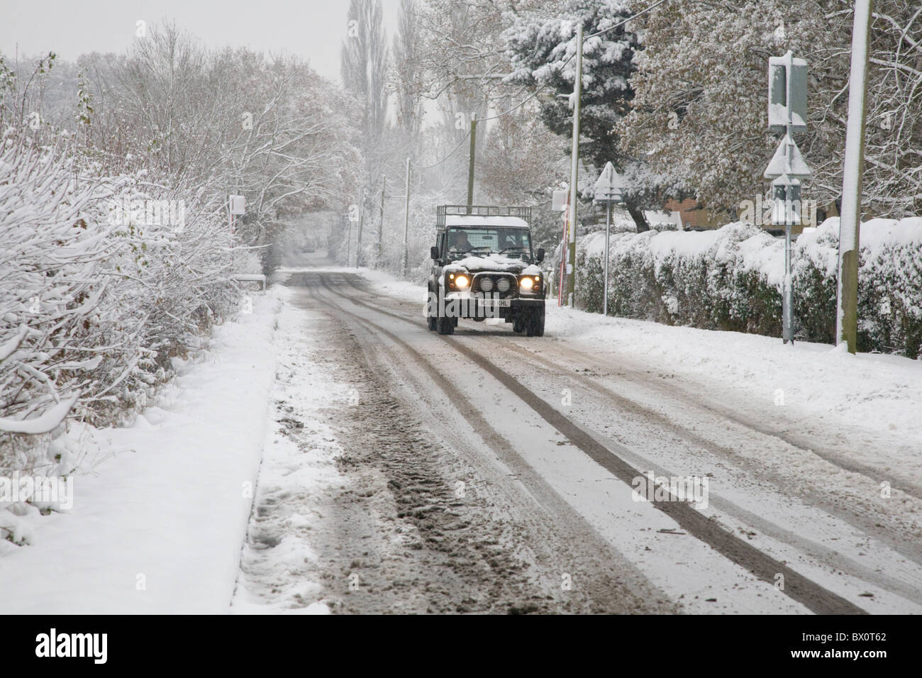 Driving along snowy roads Stock Photo - Alamy