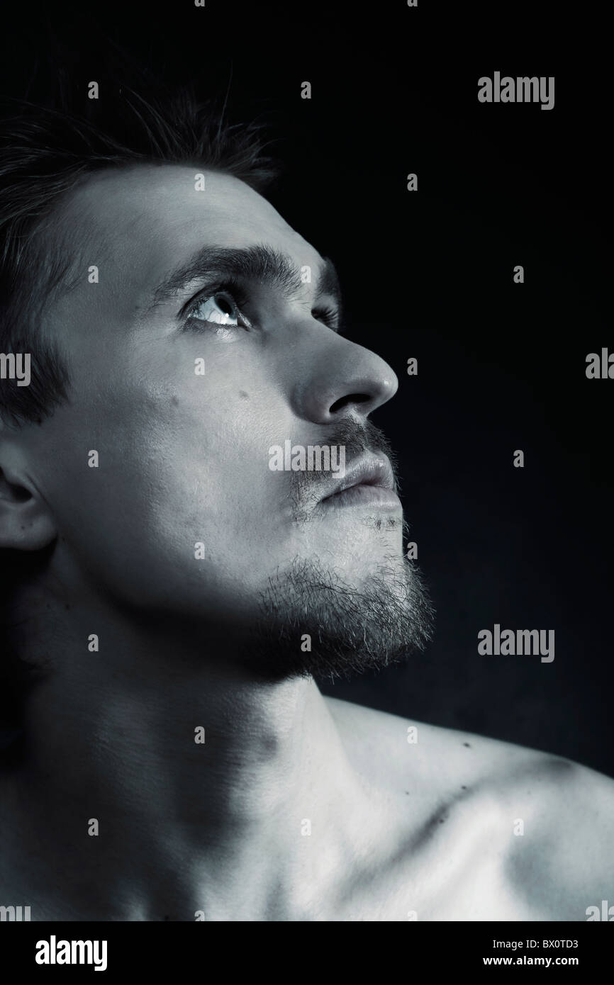 profile of sad beautiful man closeup Stock Photo - Alamy