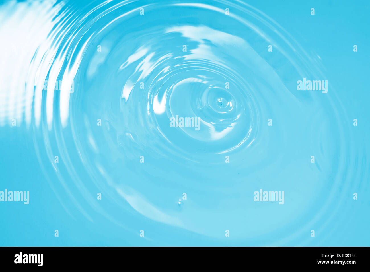 Wavy beautiful blue water surface close up Stock Photo - Alamy